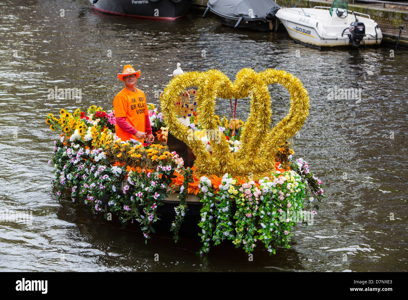 Annual Queens Day in The Netherlands. Boat parade in the canals of ...