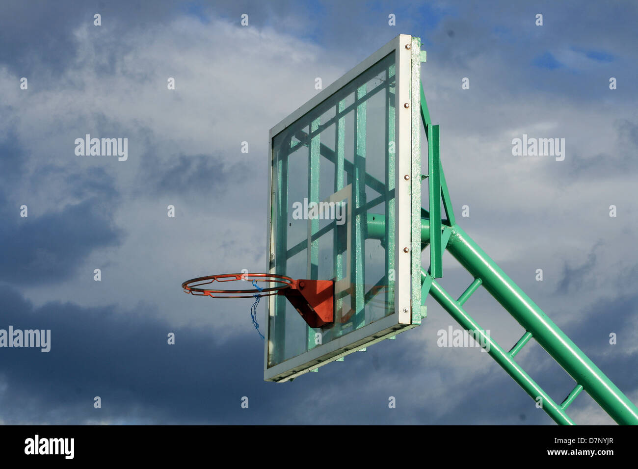 A basketball hoop with no net on an outdoor court in Cotacachi, Ecuador ...