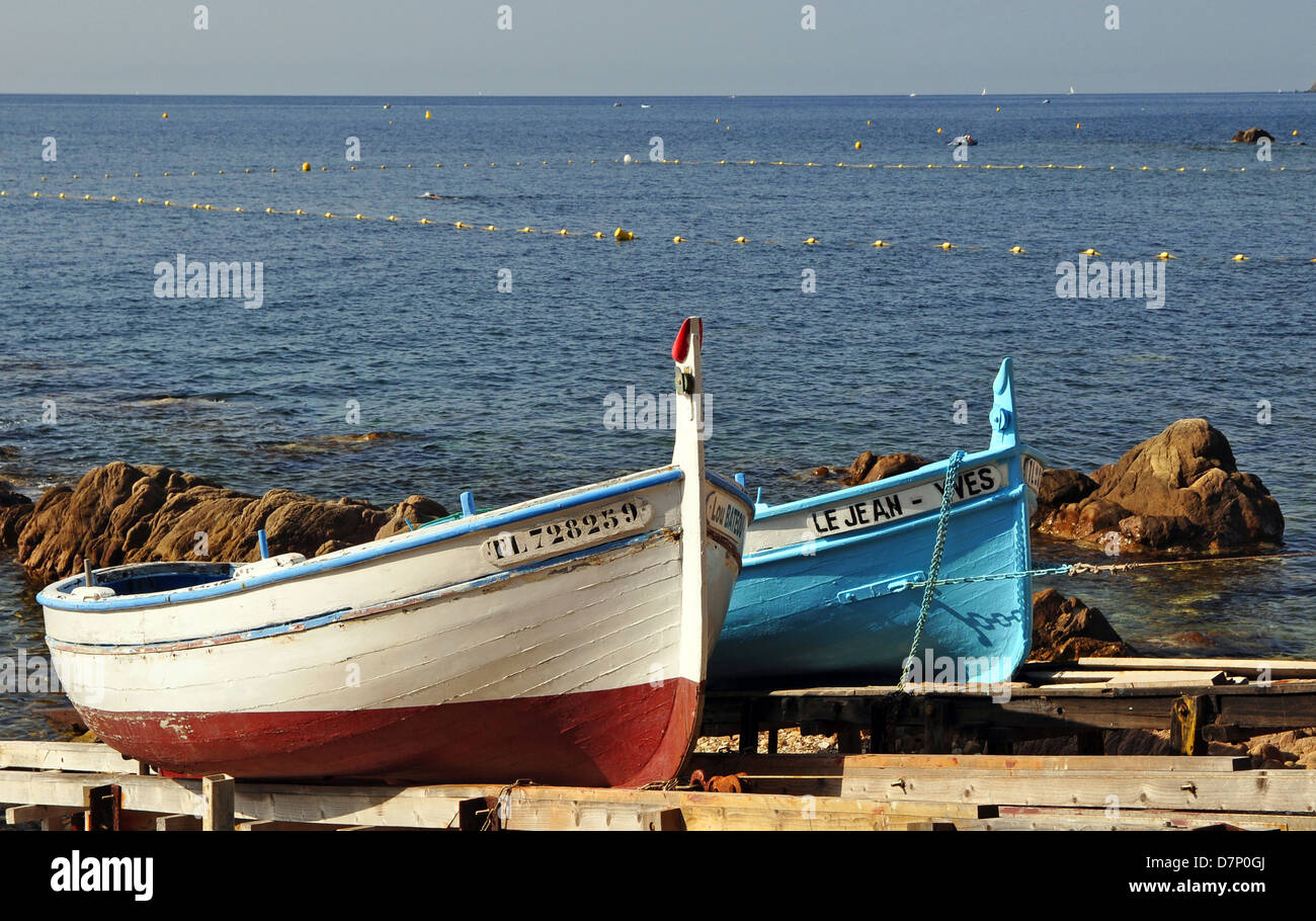 Small colorfull mediterranean fishing boats to the beach of La Verne ...