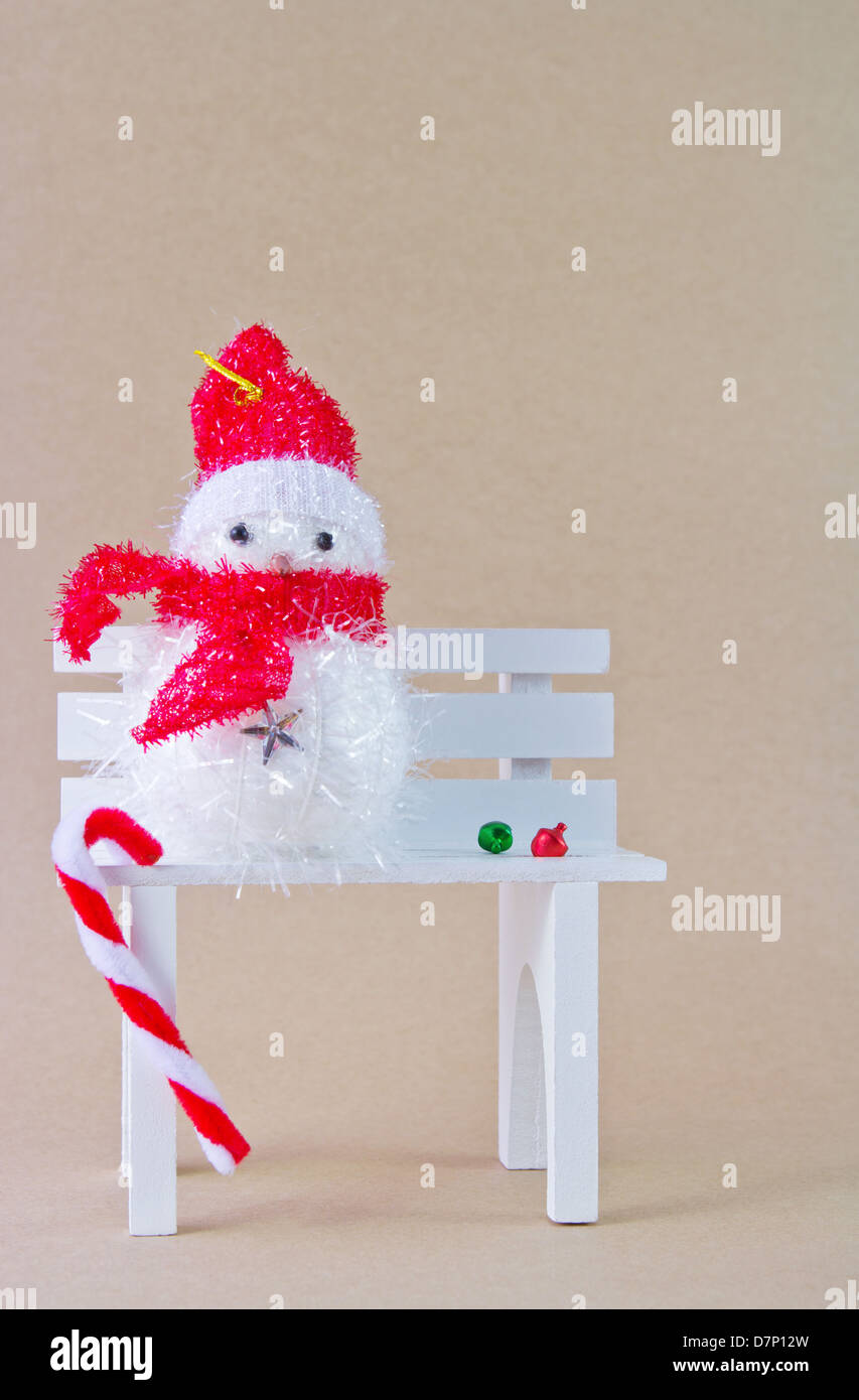 Snowman on the white chair Stock Photo - Alamy