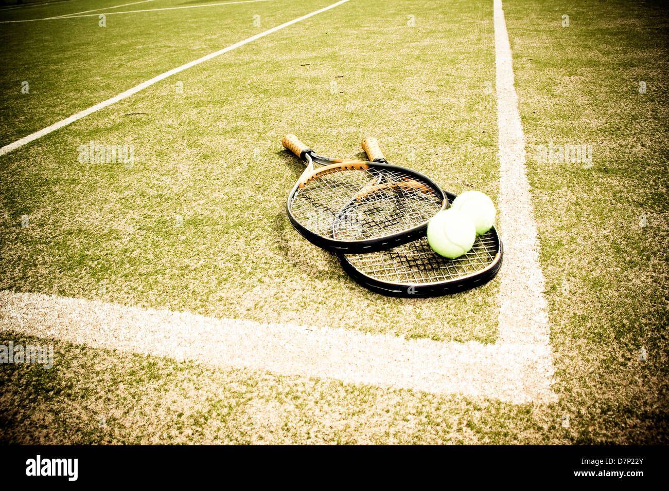 Tennis concept with racquet and balls Stock Photo - Alamy