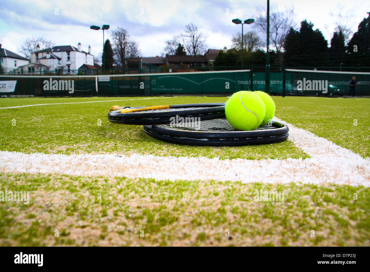 Tennis concept with racquet and balls Stock Photo - Alamy