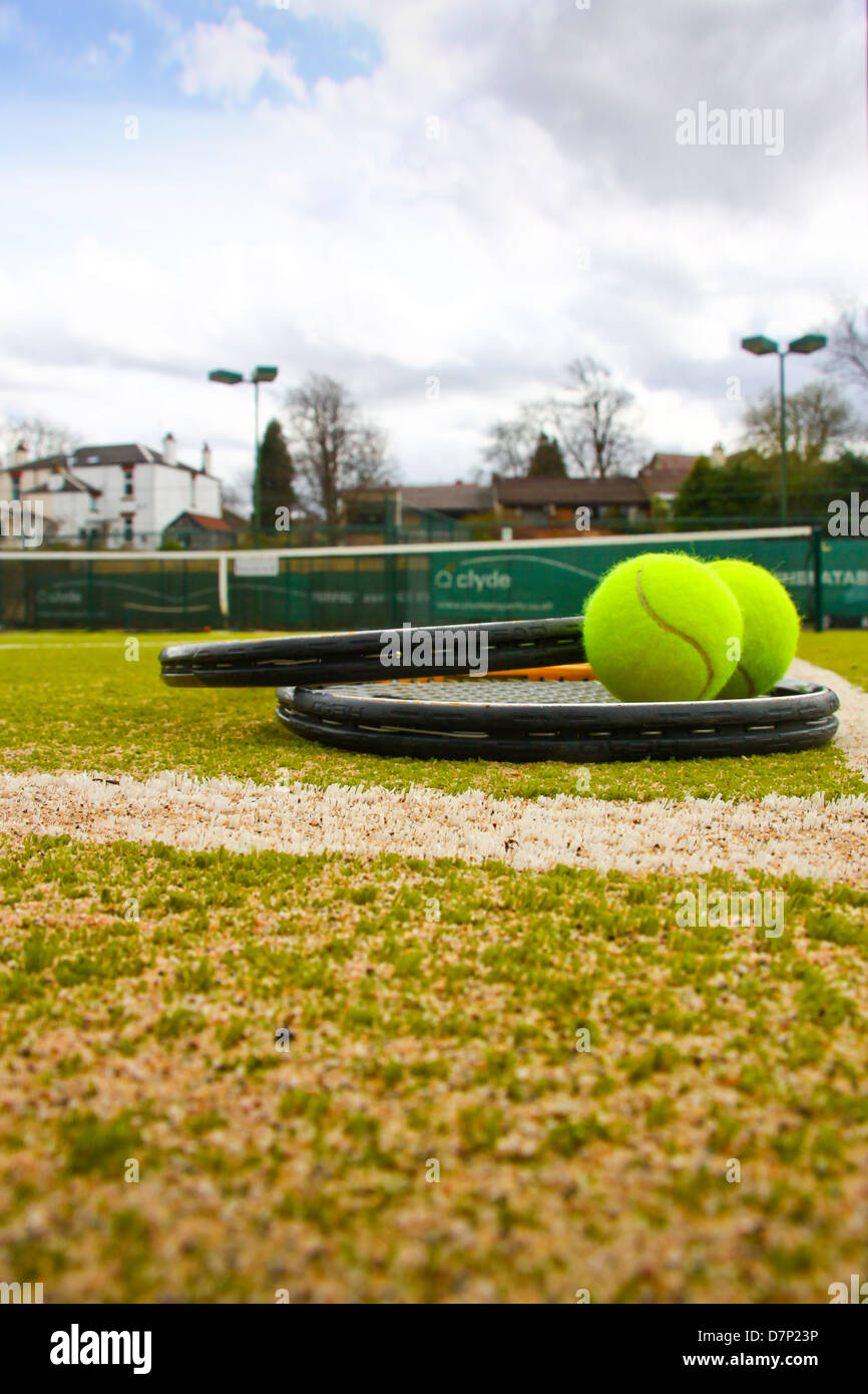 Tennis concept with racquet and balls Stock Photo - Alamy