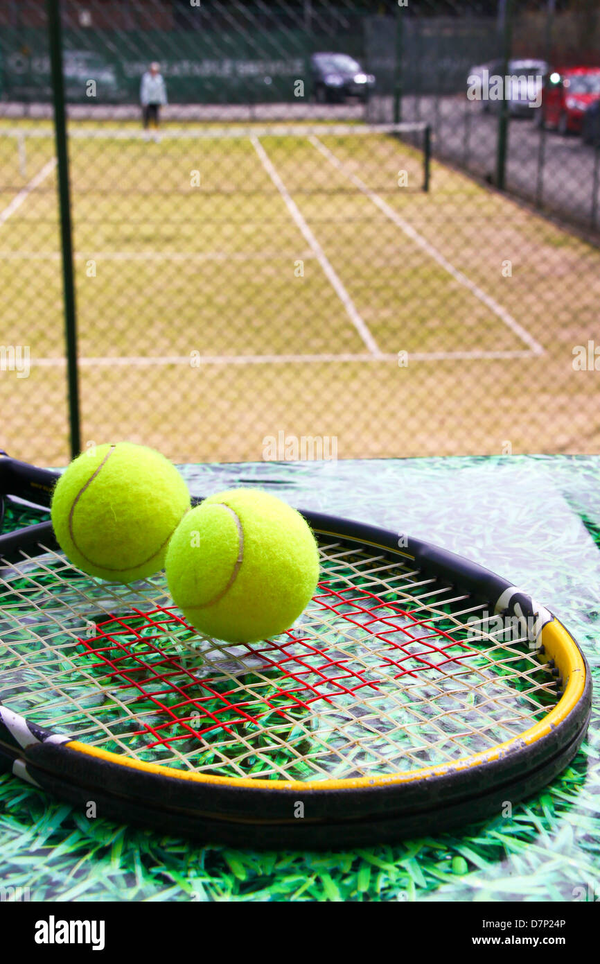 Tennis concept with racquet and balls Stock Photo - Alamy