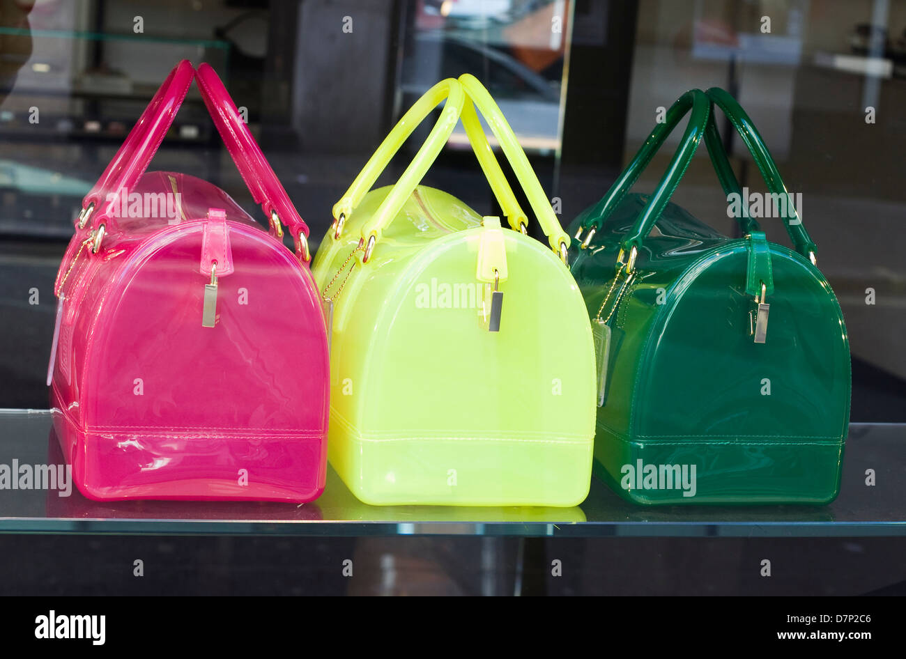 display in a store window selling Designer Handbags Stock Photo - Alamy