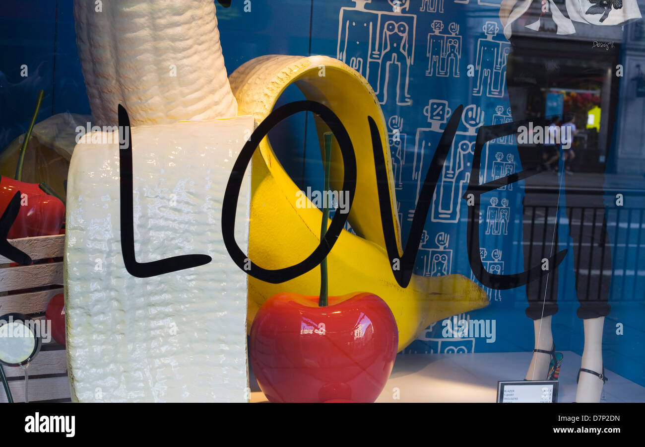 Advertisement in a store window with the word Love Stock Photo - Alamy