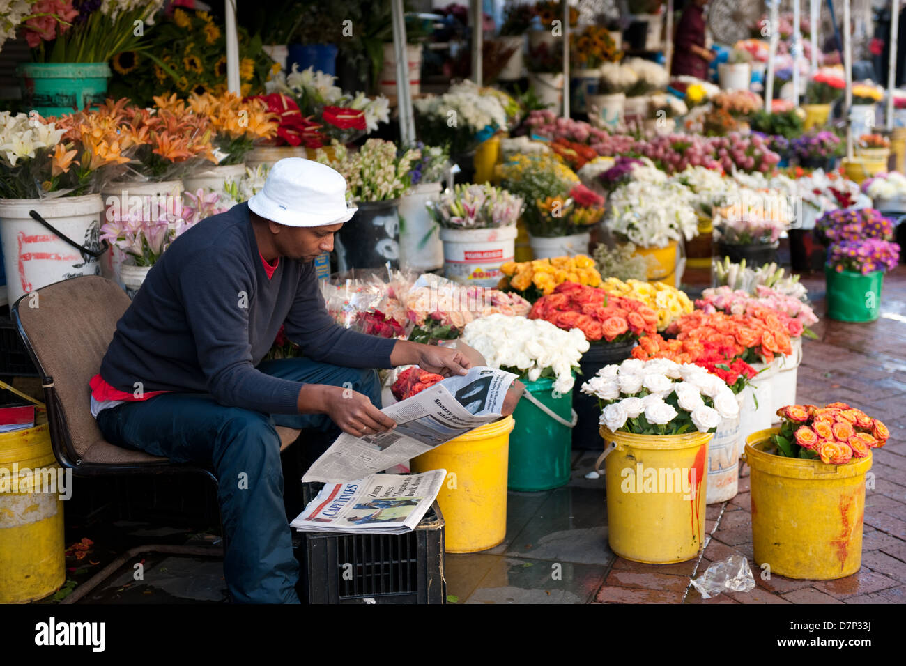 Cape Malay flower seller on Trafalgar Place, Cape Town, South Africa ...