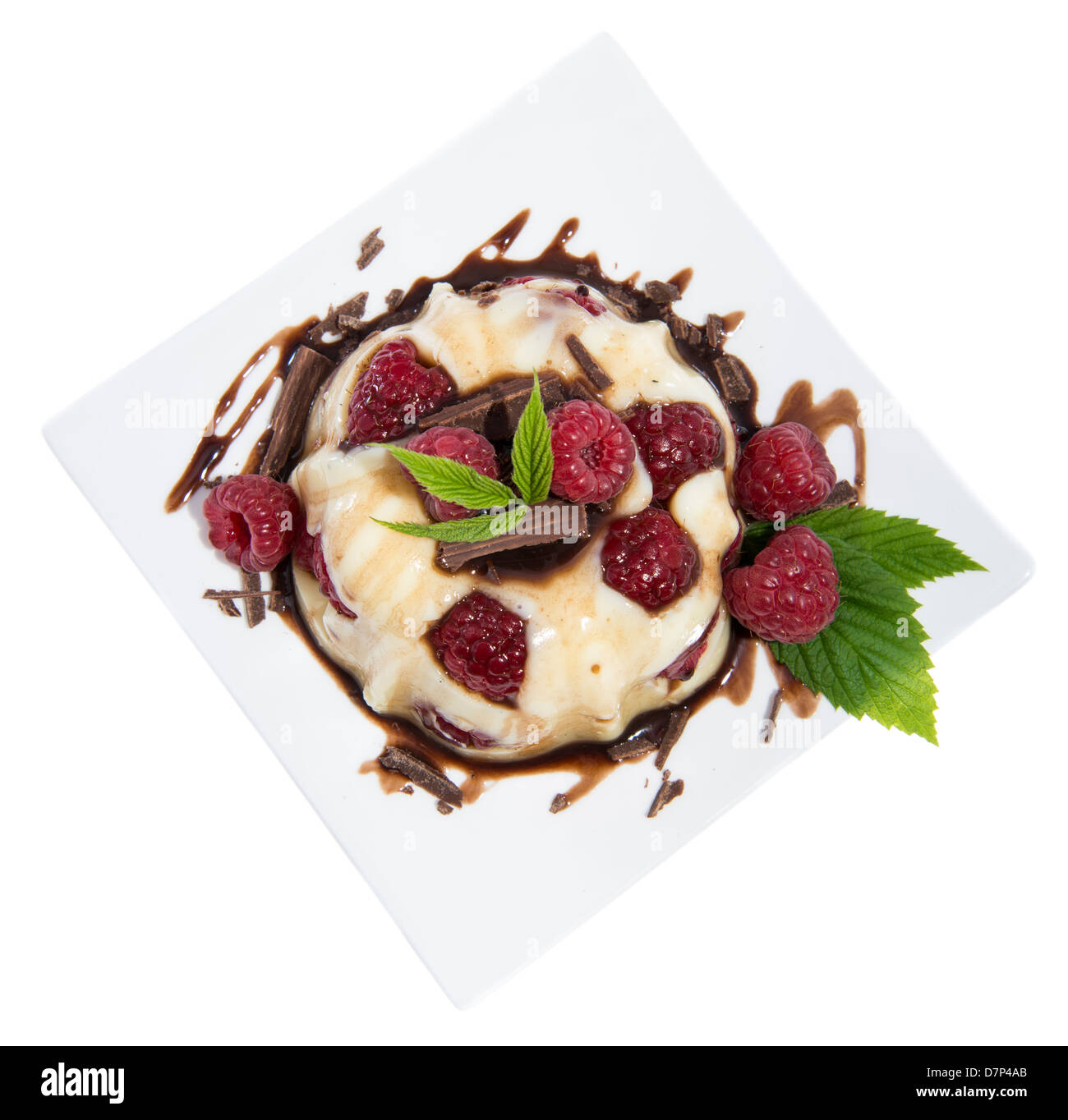 Raspberry vanilla Pudding with fresh berries isolated on white ...