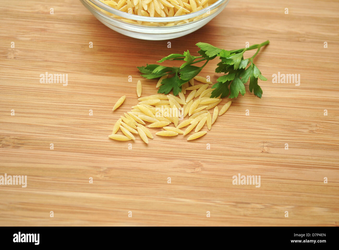 Risoni Pasta with Italian Parsley Stock Photo - Alamy