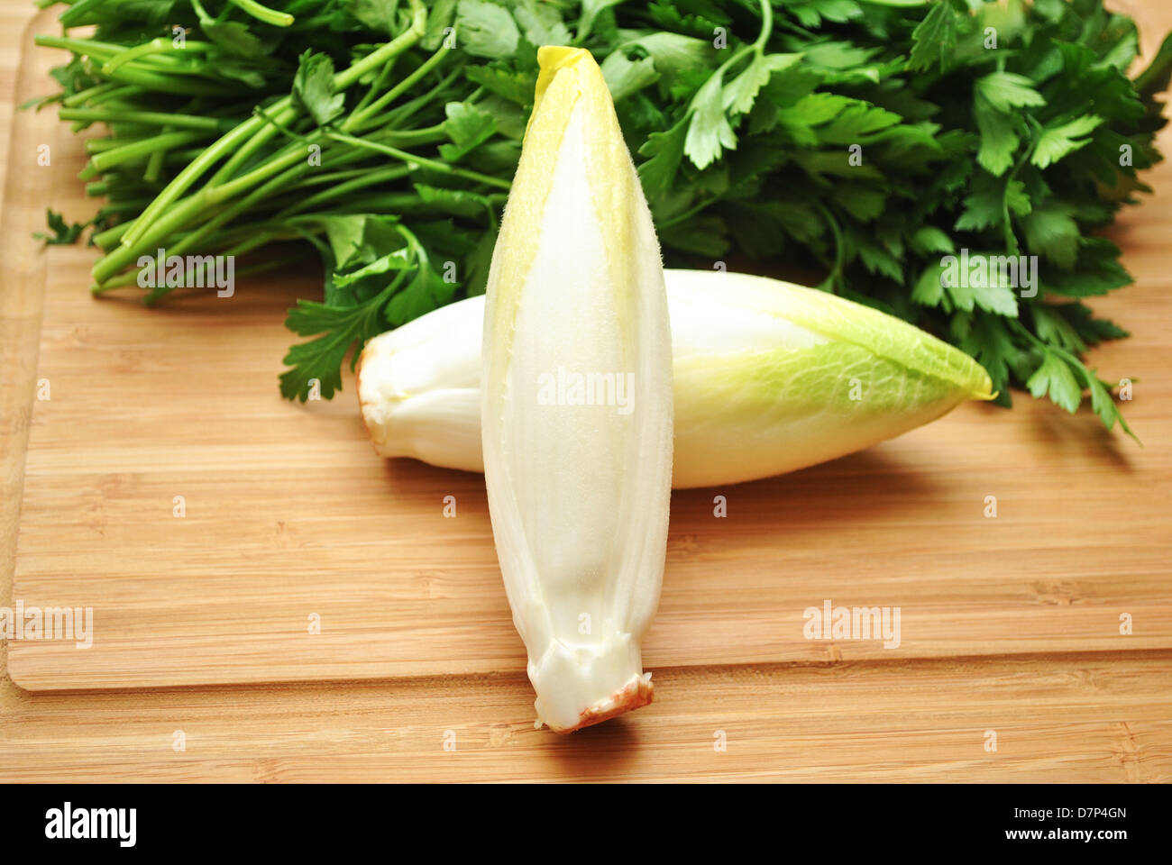 Two Endive with Fresh Italian Parsley Stock Photo - Alamy