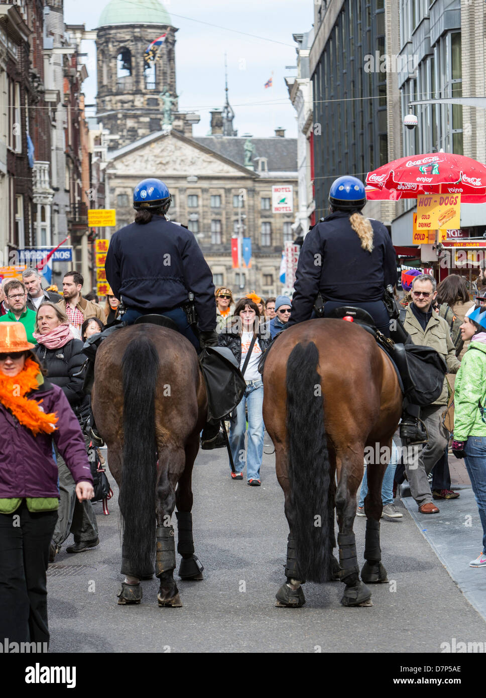 Police patrol in Amsterdam, during queens day celebrations Stock Photo ...