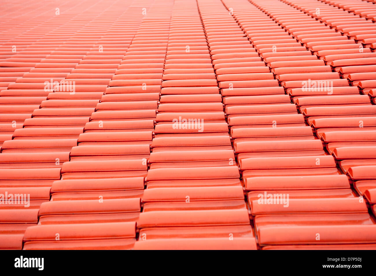 rows of red tiles roof abstract texture Stock Photo - Alamy