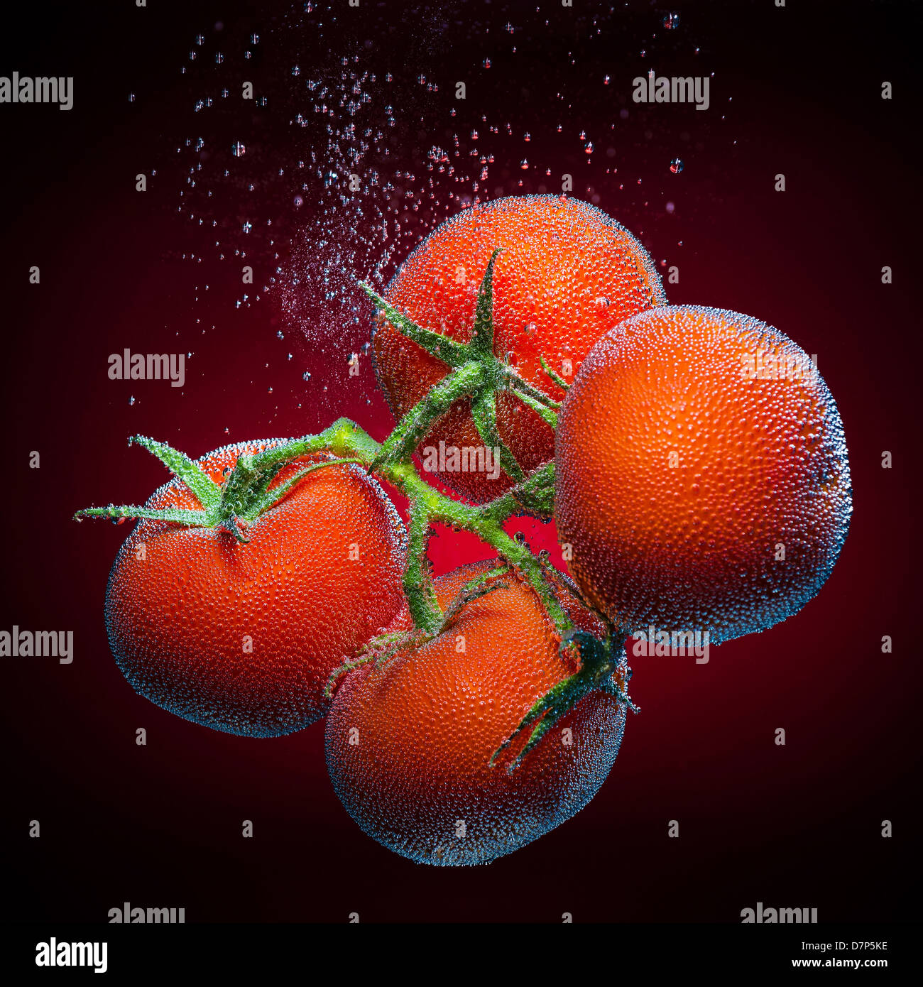 Tomatoes with bubbles Stock Photo - Alamy