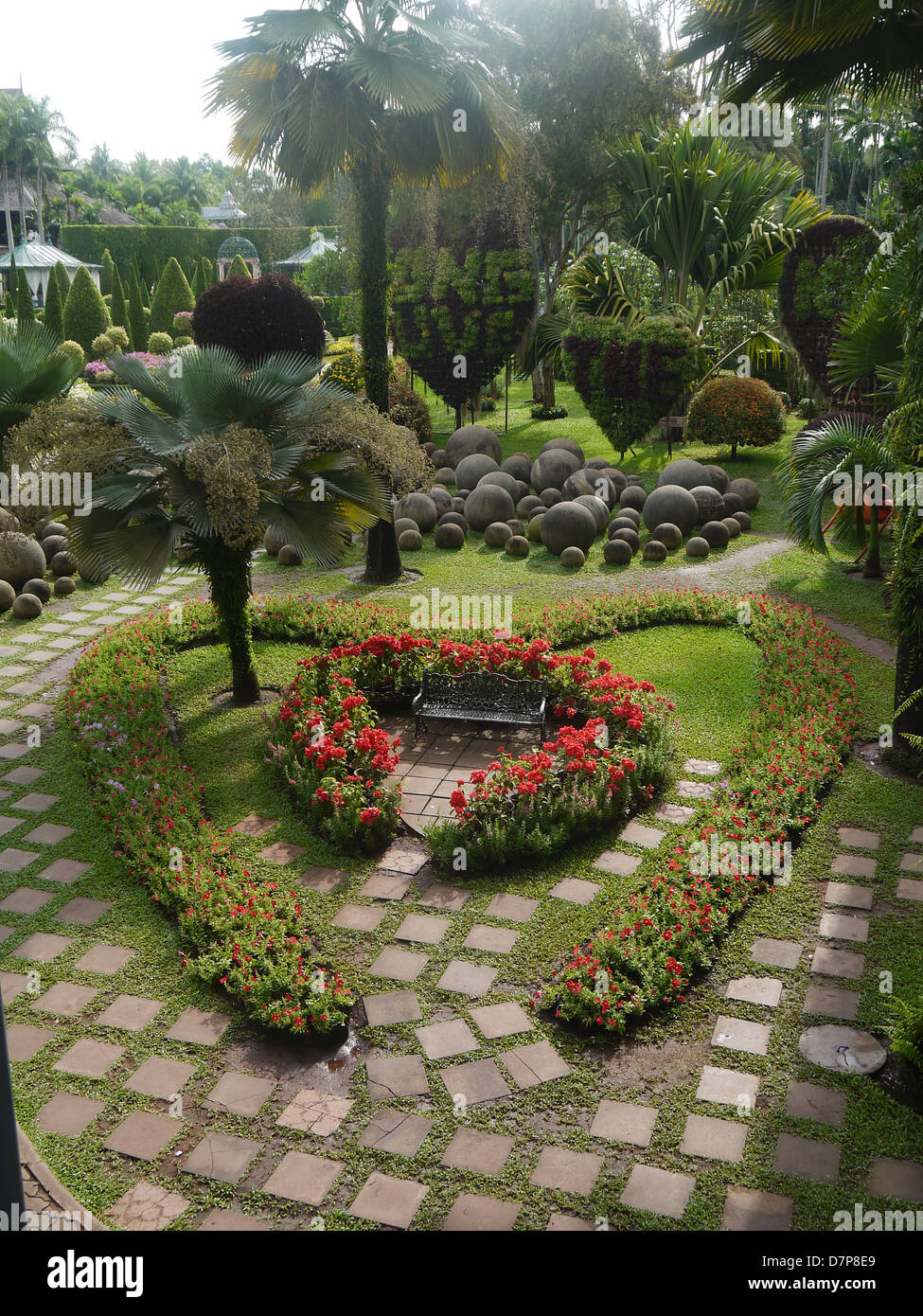Beautiful flower garden in heart shape Stock Photo - Alamy
