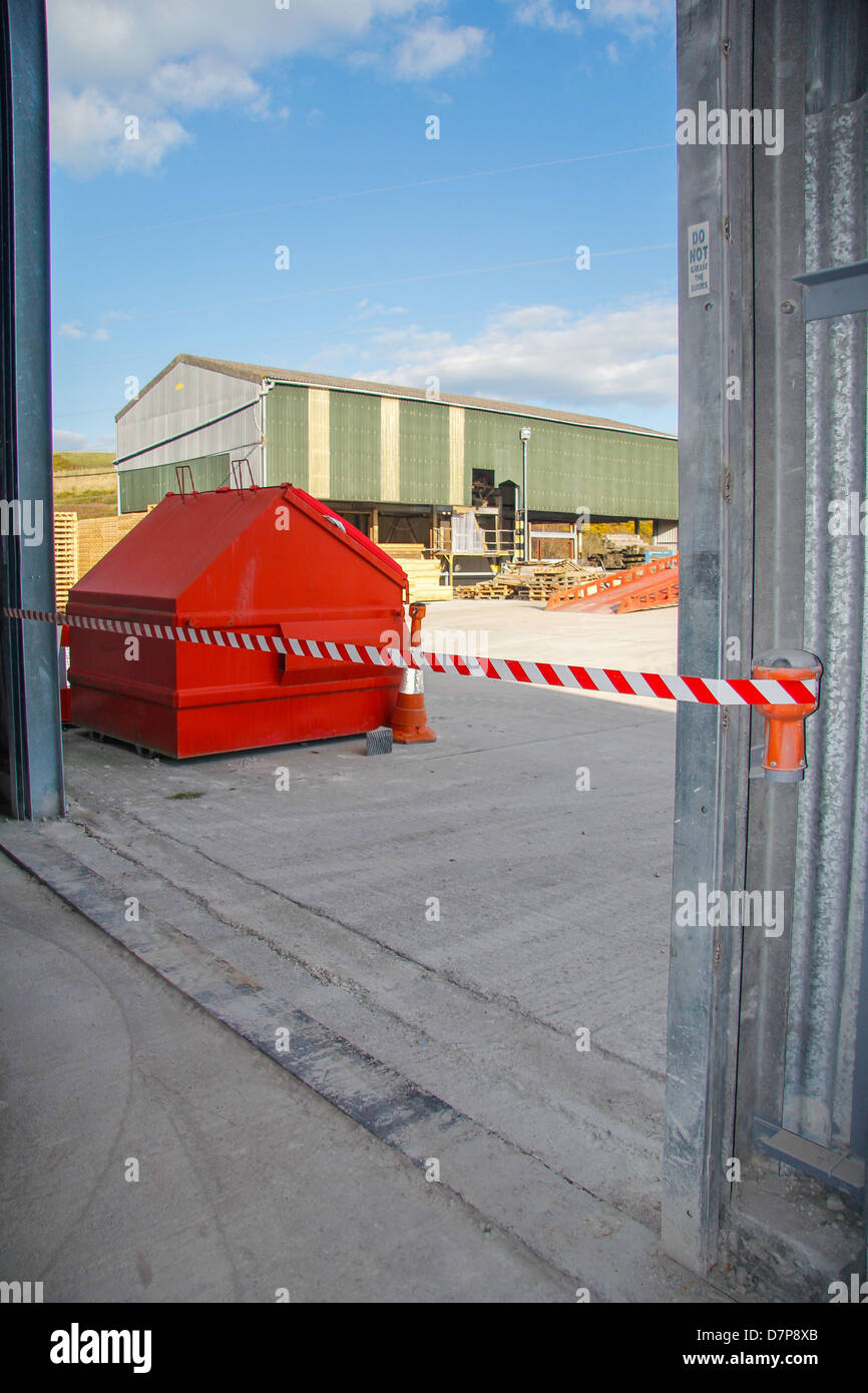 Temporary tape safety barrier across a factory door way Stock Photo - Alamy