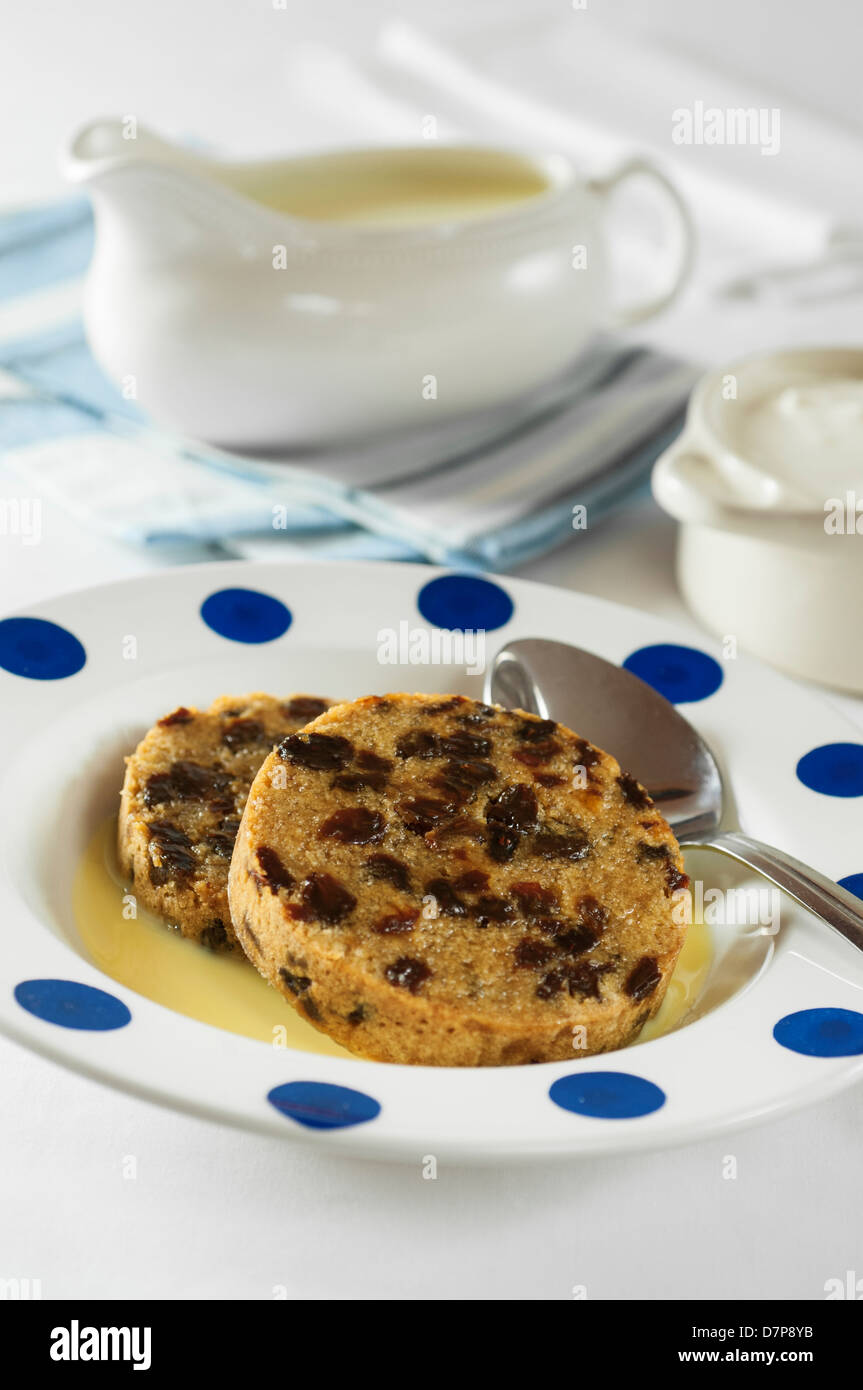 Spotted Dick Steamed fruit pudding Traditional dessert UK Stock Photo ...