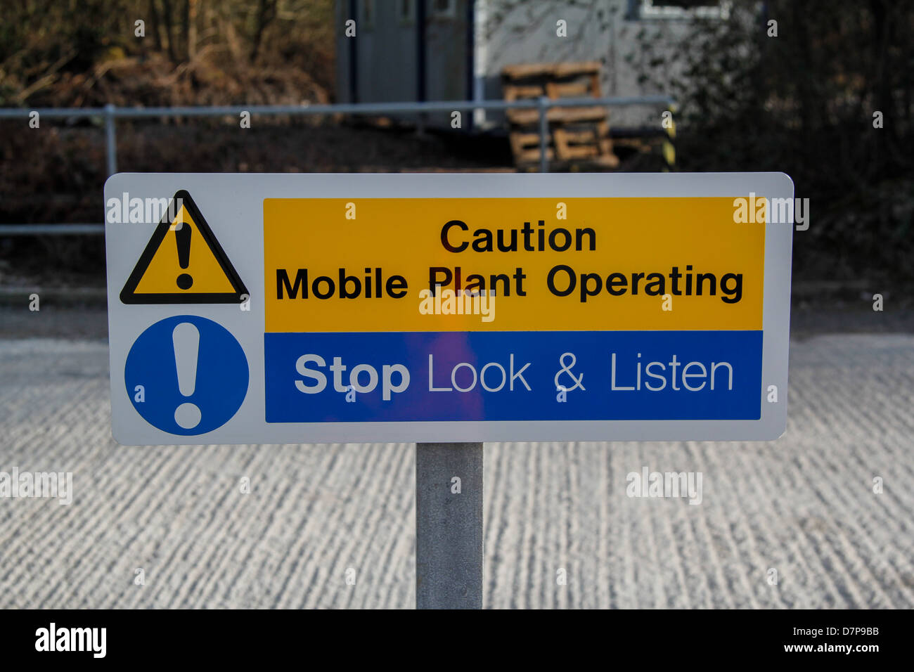 Caution Mobile plant Operating sign Stock Photo - Alamy