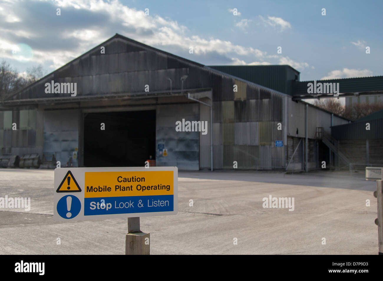 An Industrial site mobile plant safety warning sign Stock Photo - Alamy