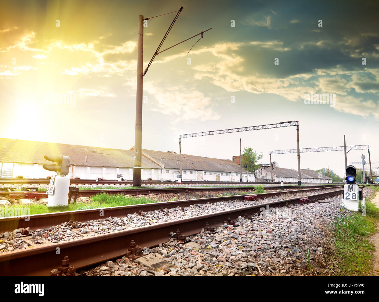 Traffic light shows blue signal on railway Stock Photo - Alamy