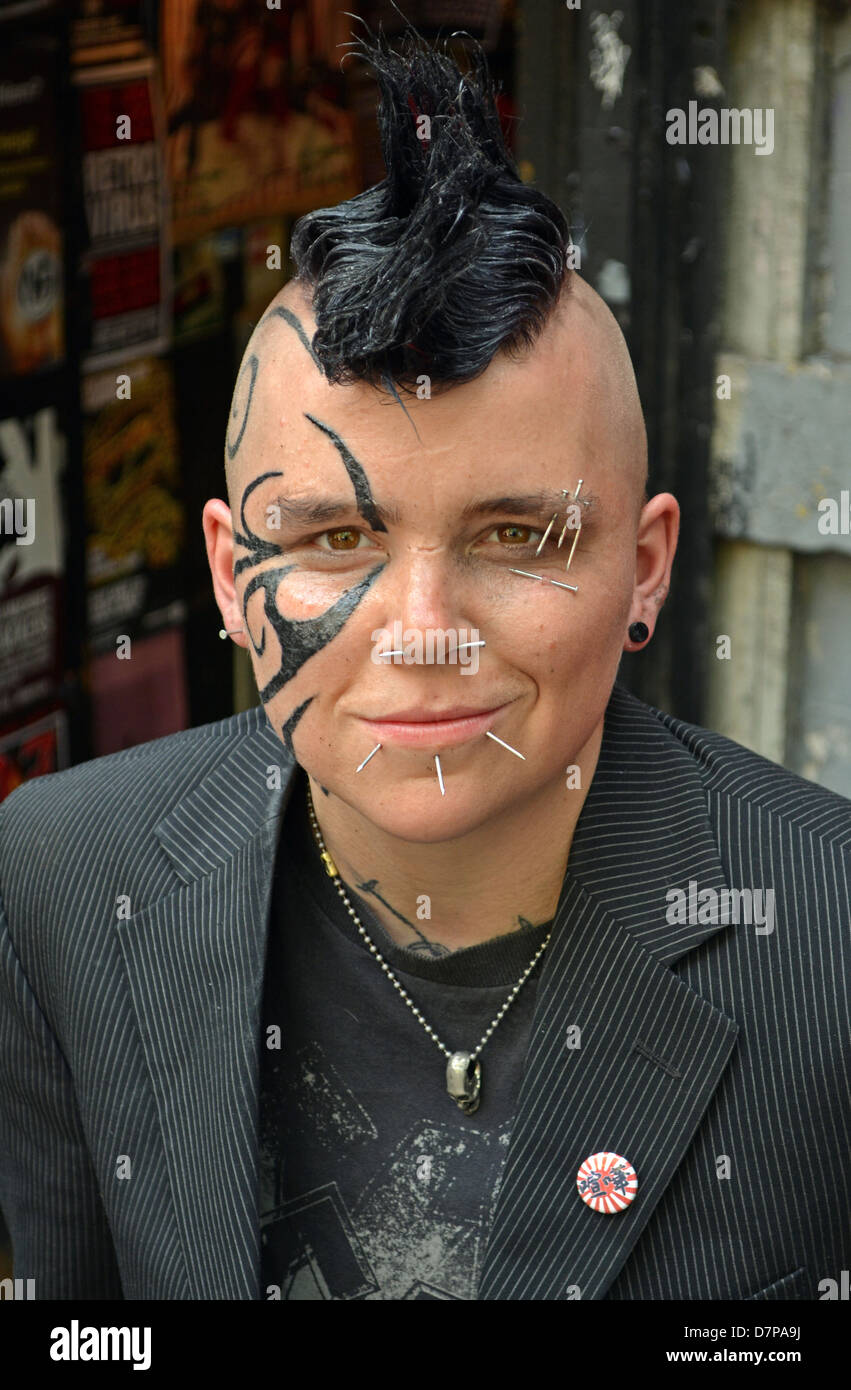 Portrait in Greenwich Village with a Mohawk hairdo, face tattoo and ...