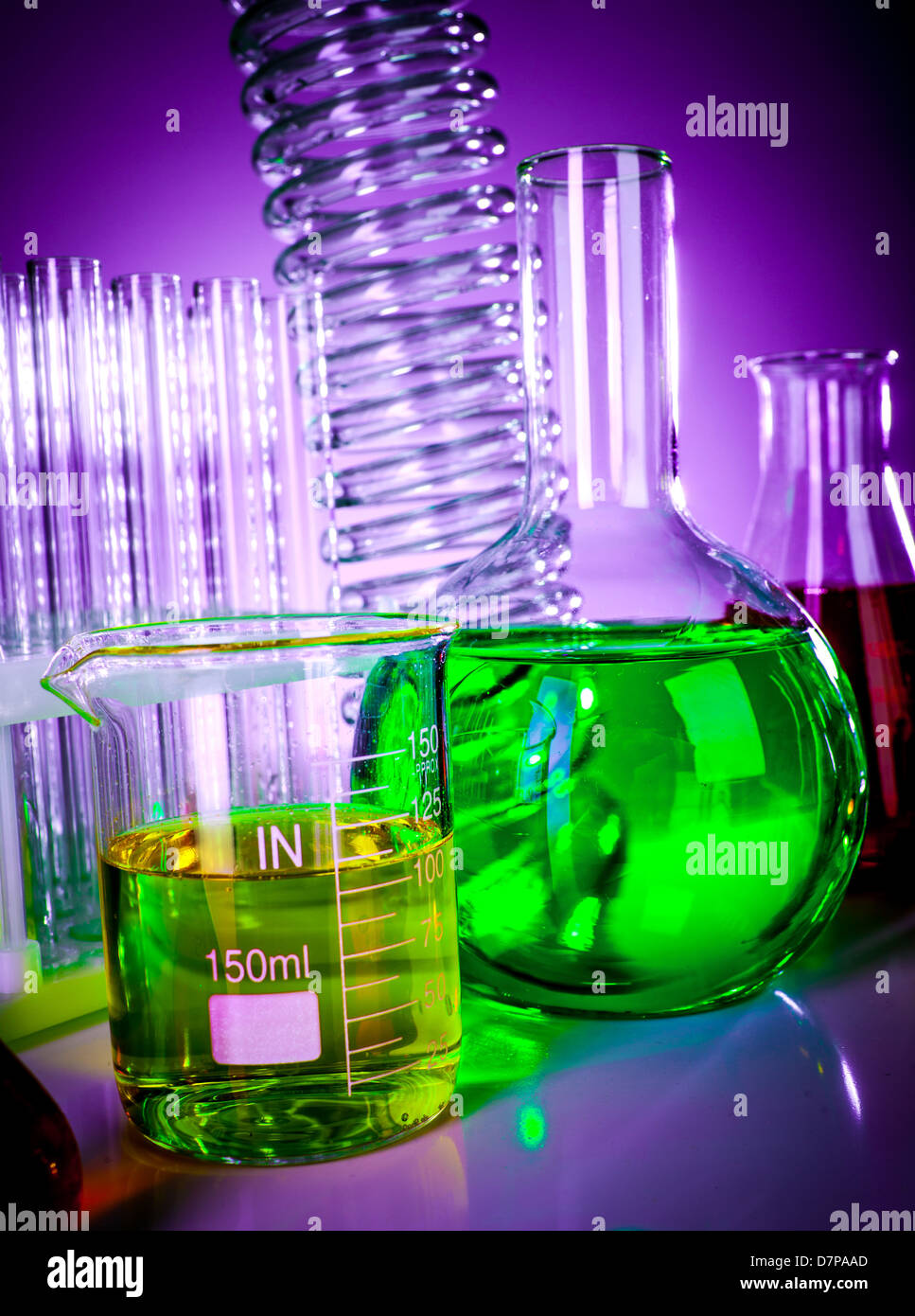Glass test tubes in the laboratory on a purple background Stock Photo ...