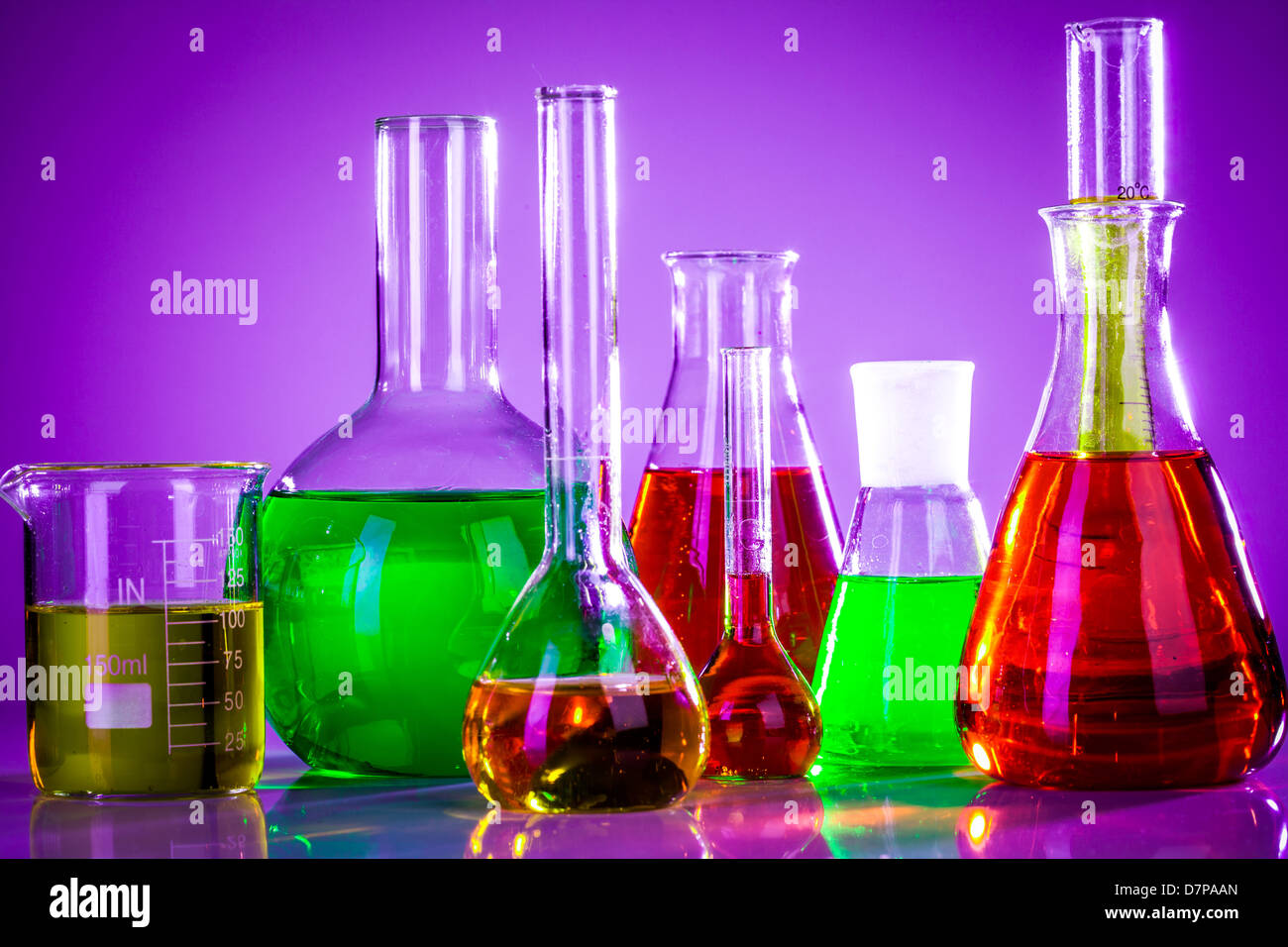 Glass test tubes in the laboratory on a purple background Stock Photo ...