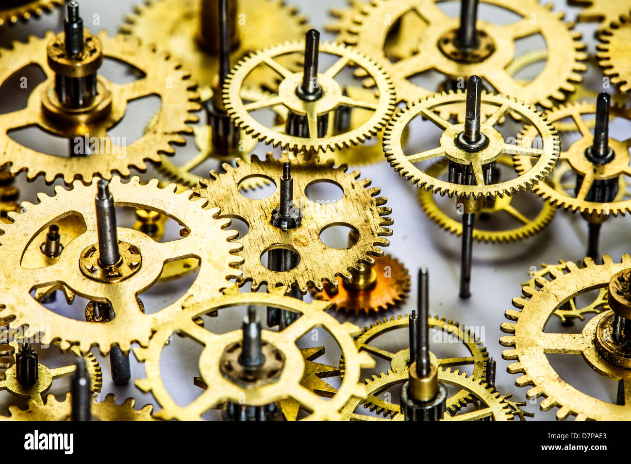 close up old mechanism on a gray background Stock Photo - Alamy