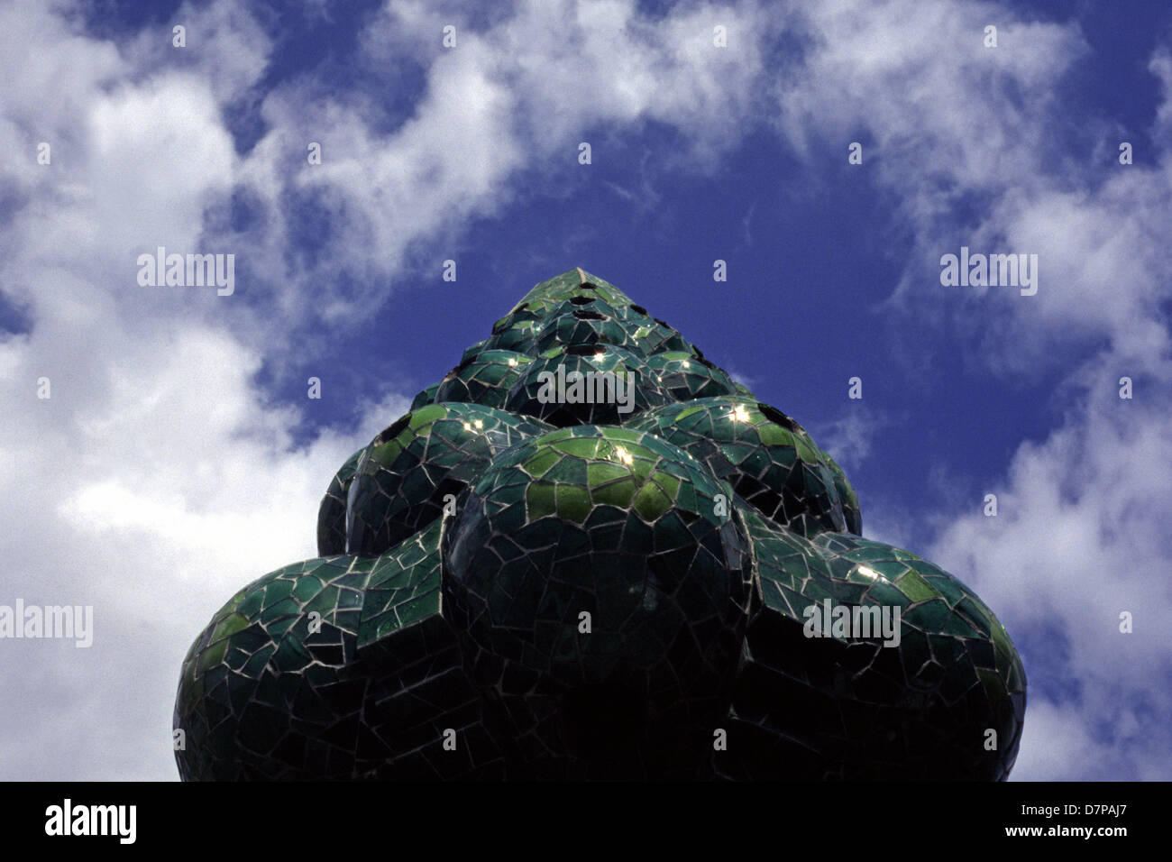 The green chimney pod or ventilation shaft on the roof of Palau Guell a ...