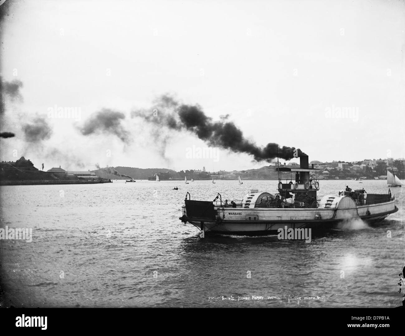 This historic photograph of the North Shore Horse Ferry in Sydney shows ...