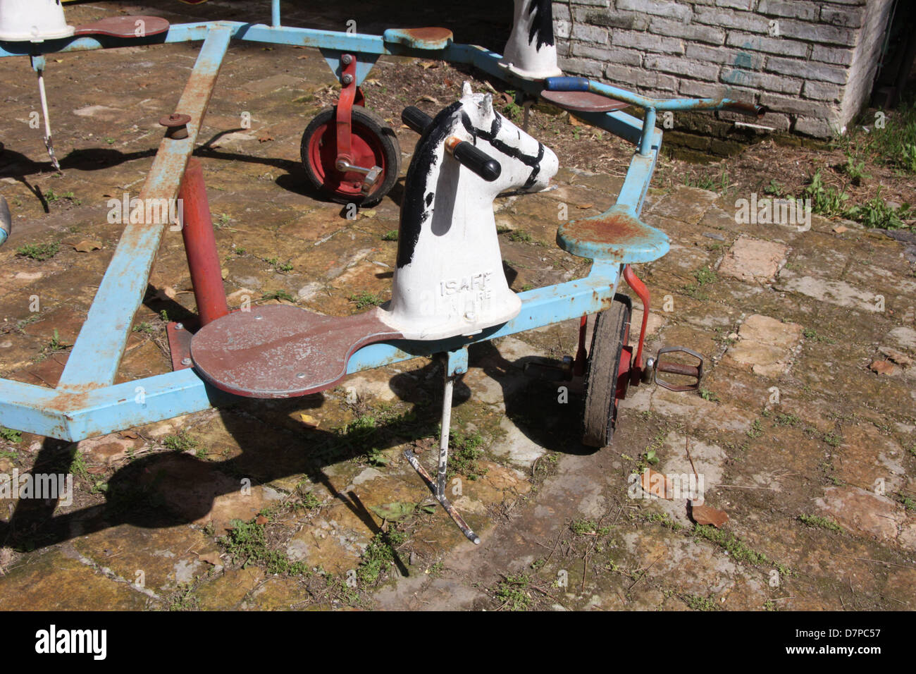 old roundabout ride in play ground on farm near rome italy Stock Photo ...