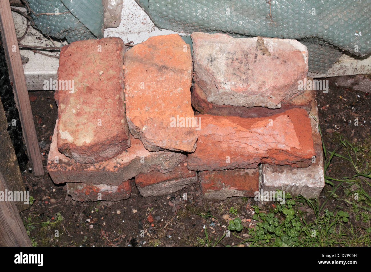 A bunch of bricks packed together in the garden Stock Photo - Alamy