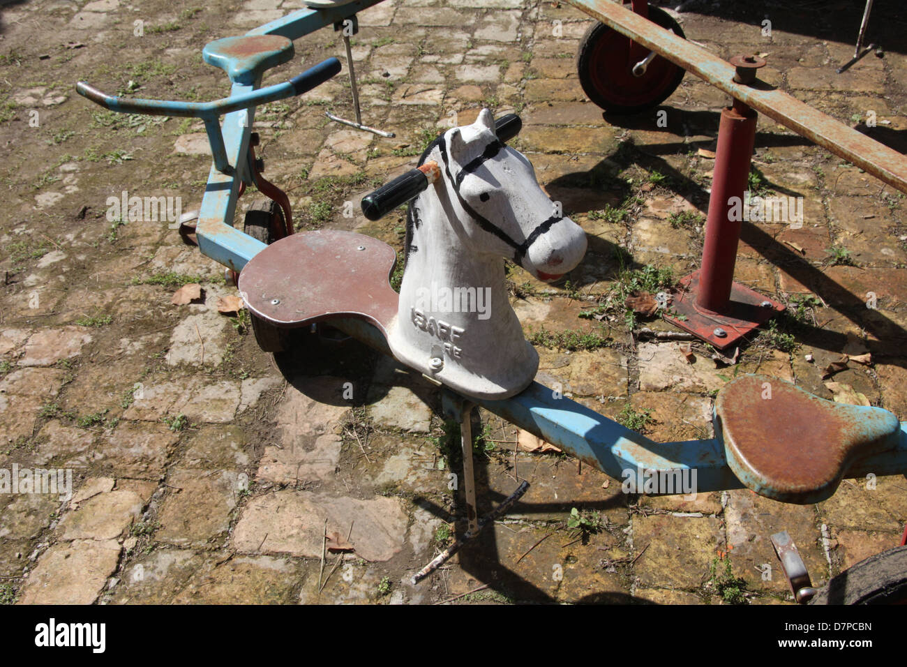 old roundabout ride in play ground on farm near rome italy Stock Photo ...