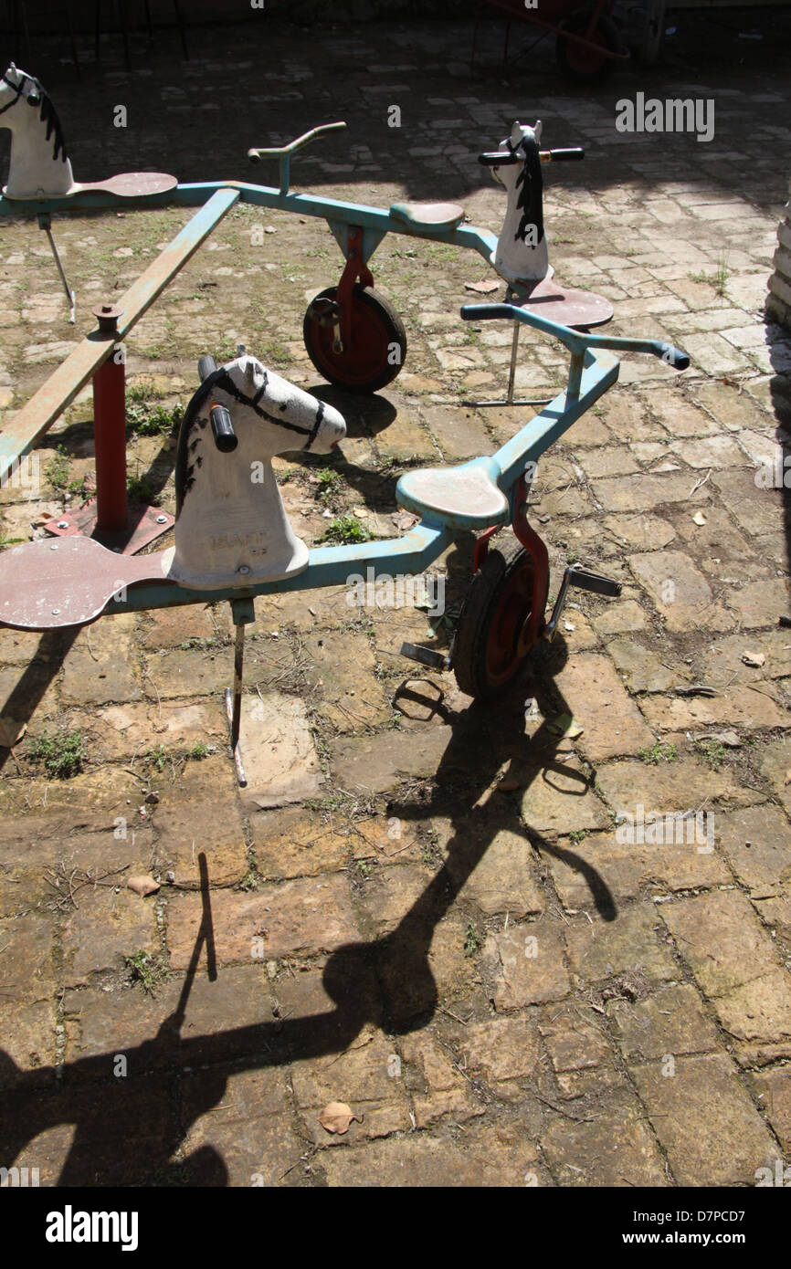 old roundabout ride in play ground on farm near rome italy Stock Photo ...