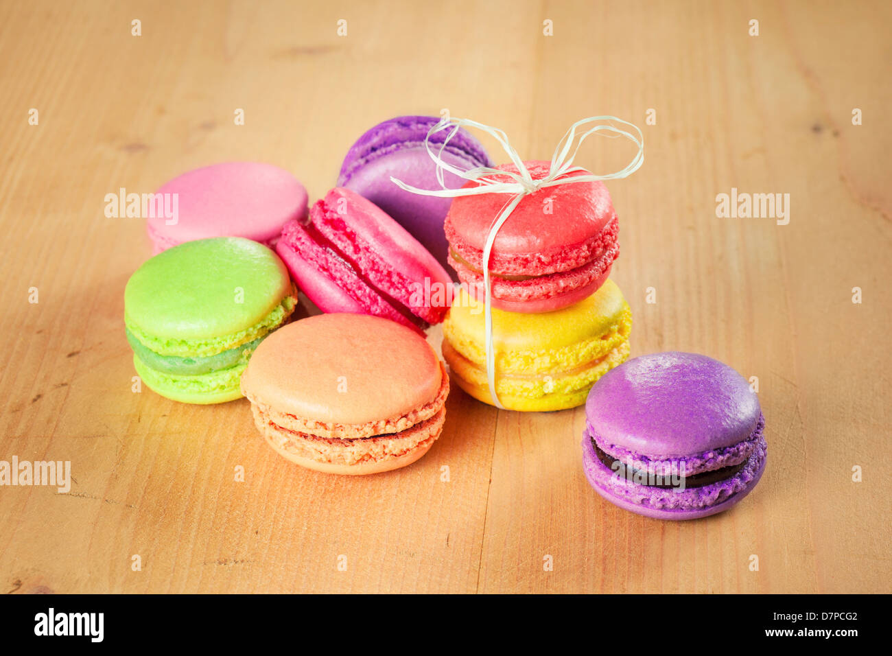 traditional french colorful macarons on wooden table Stock Photo - Alamy