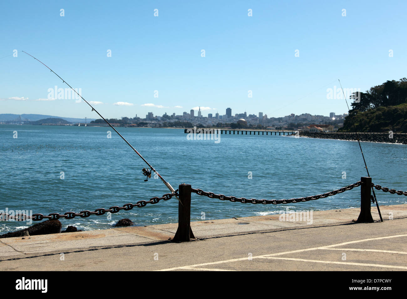Fishing Rods near the Golden Gate Bridge looking towards Torpedo Wharf ...