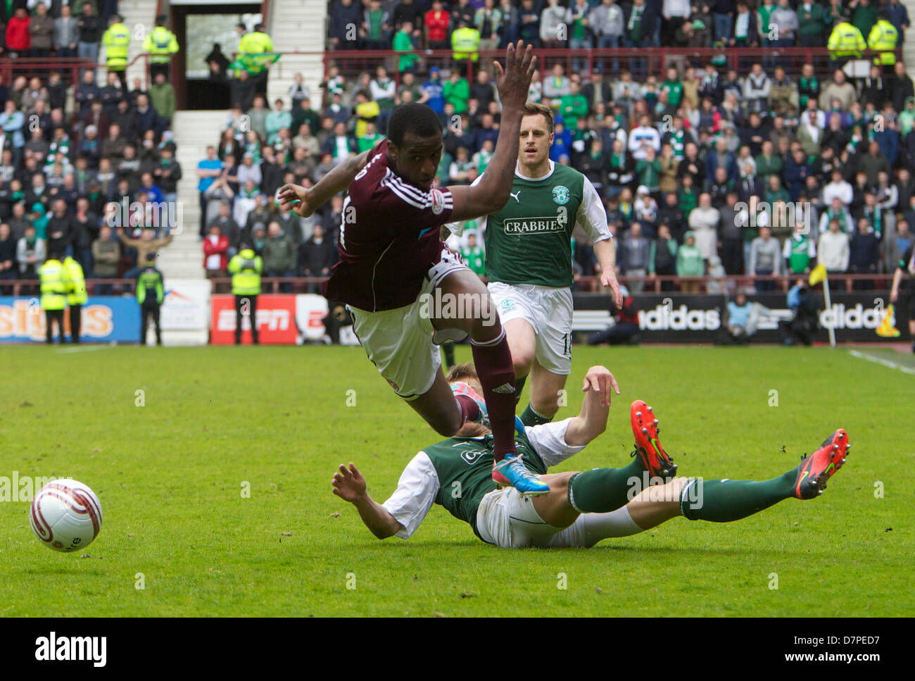 Edinburgh, Scotland. 12th May 2013. Hearts Michael Ngoo is tackled by ...