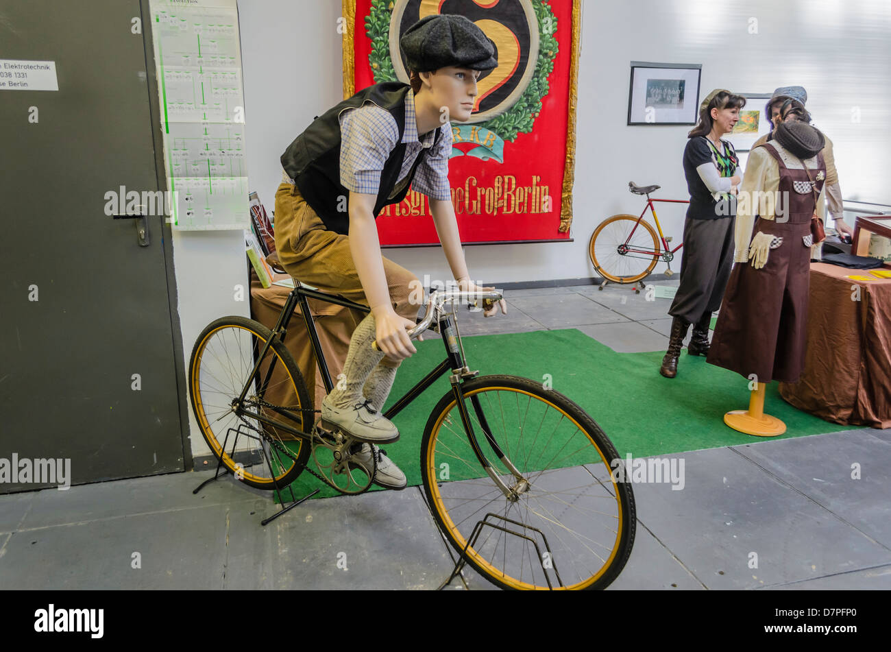 Male mannequin riding historical bicycle at Bicycle Fair in Berlin ...