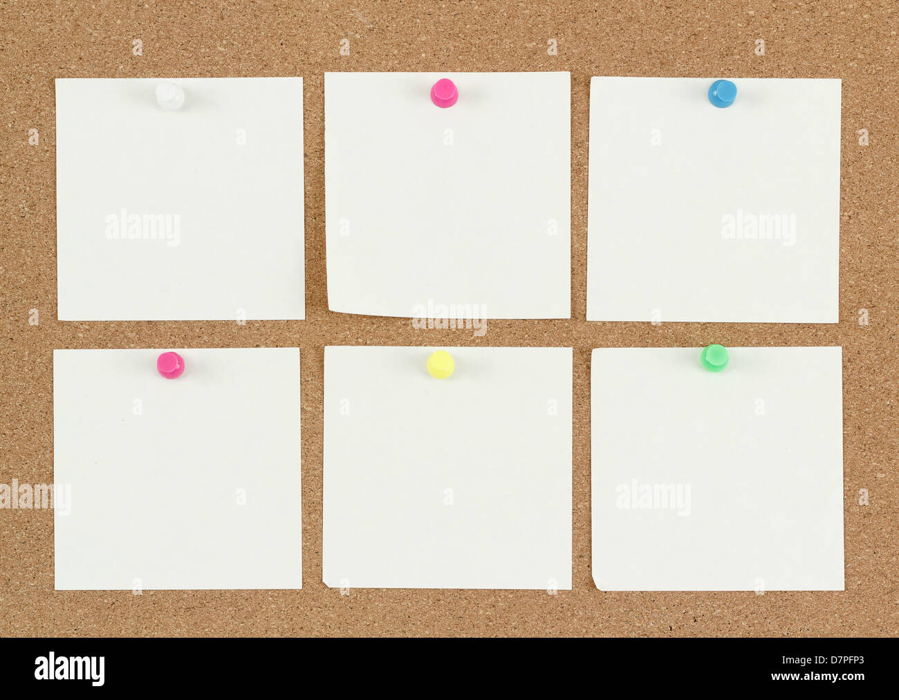 four empty note papers on cork board Stock Photo - Alamy