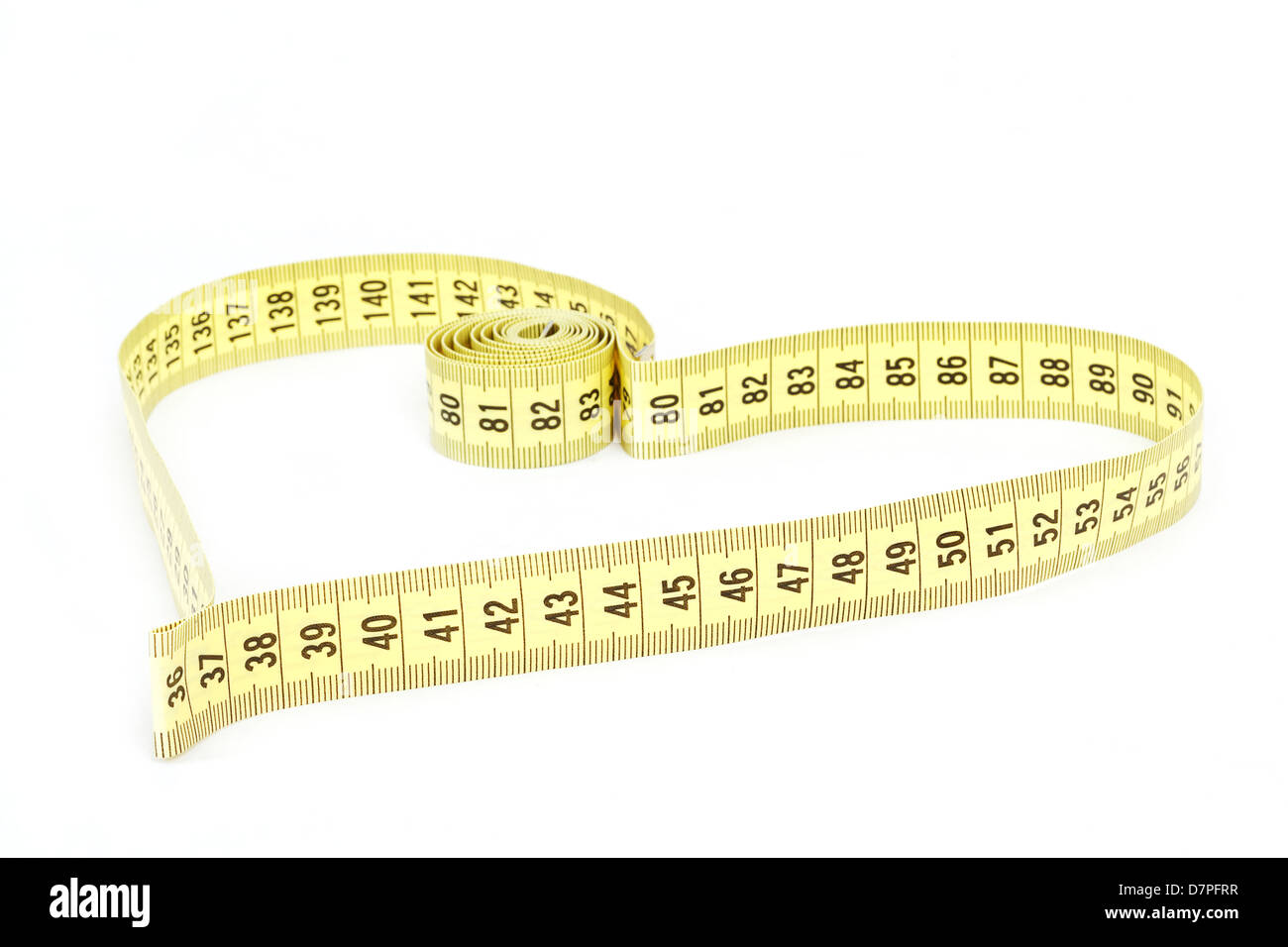 A measuring tape shaping a heart isolated on white background Stock ...
