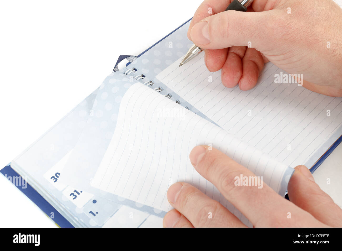Close-up of hand beginning to write on notes on white background Stock ...