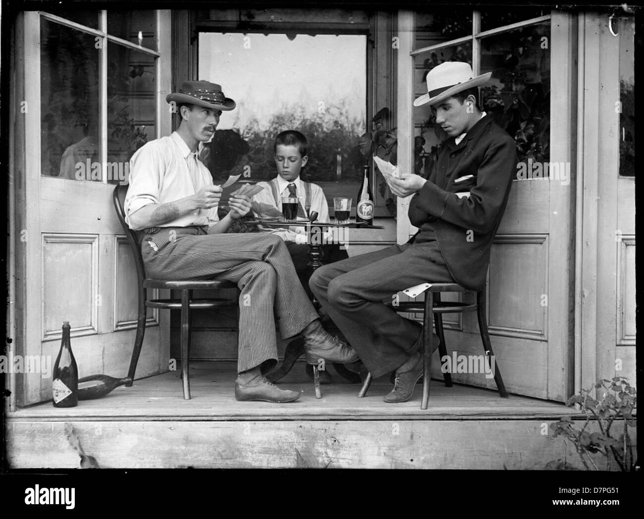Old men playing cards in hi-res stock photography and images - Alamy