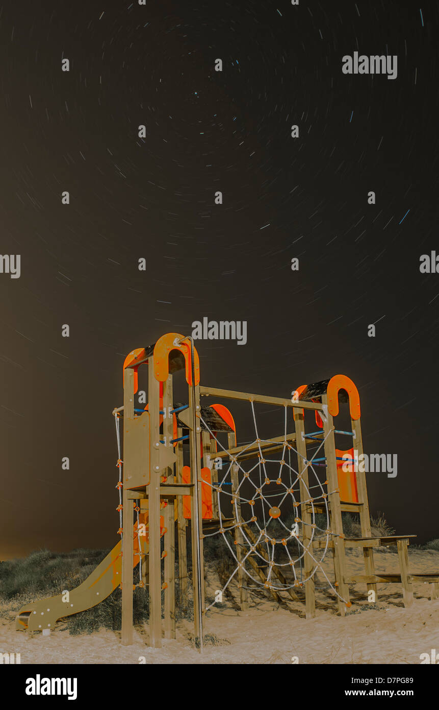 playground under the stars at night Stock Photo - Alamy