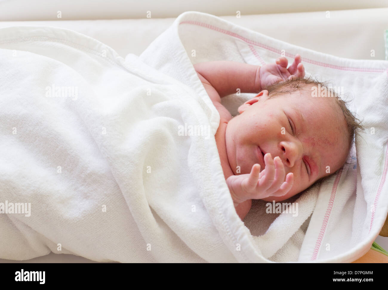 Newborn baby girl with colic problem crying Stock Photo - Alamy