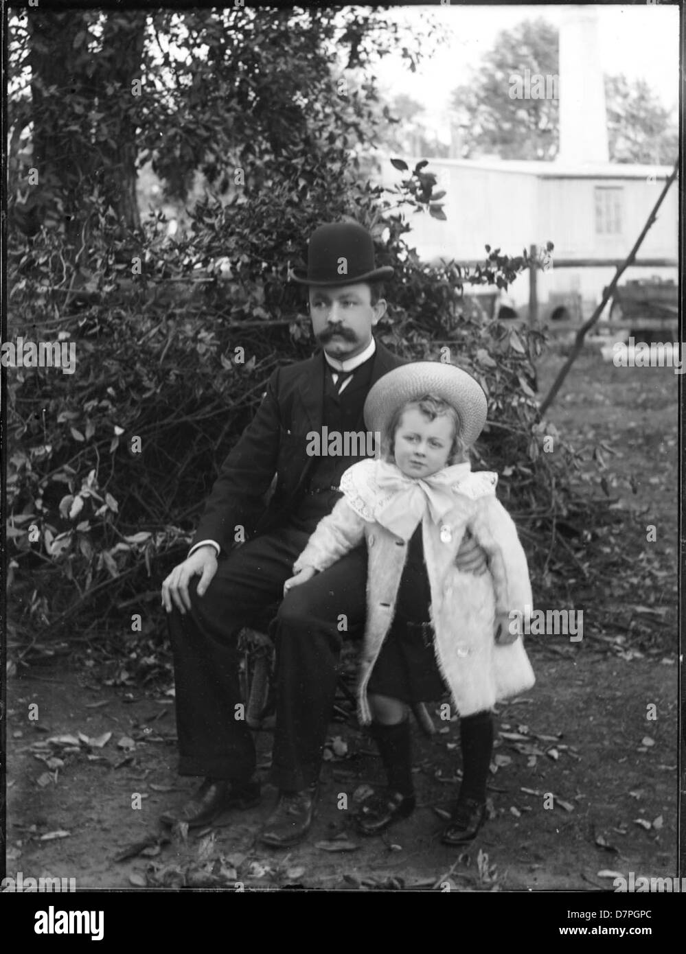 Man too small suit Black and White Stock Photos & Images - Alamy