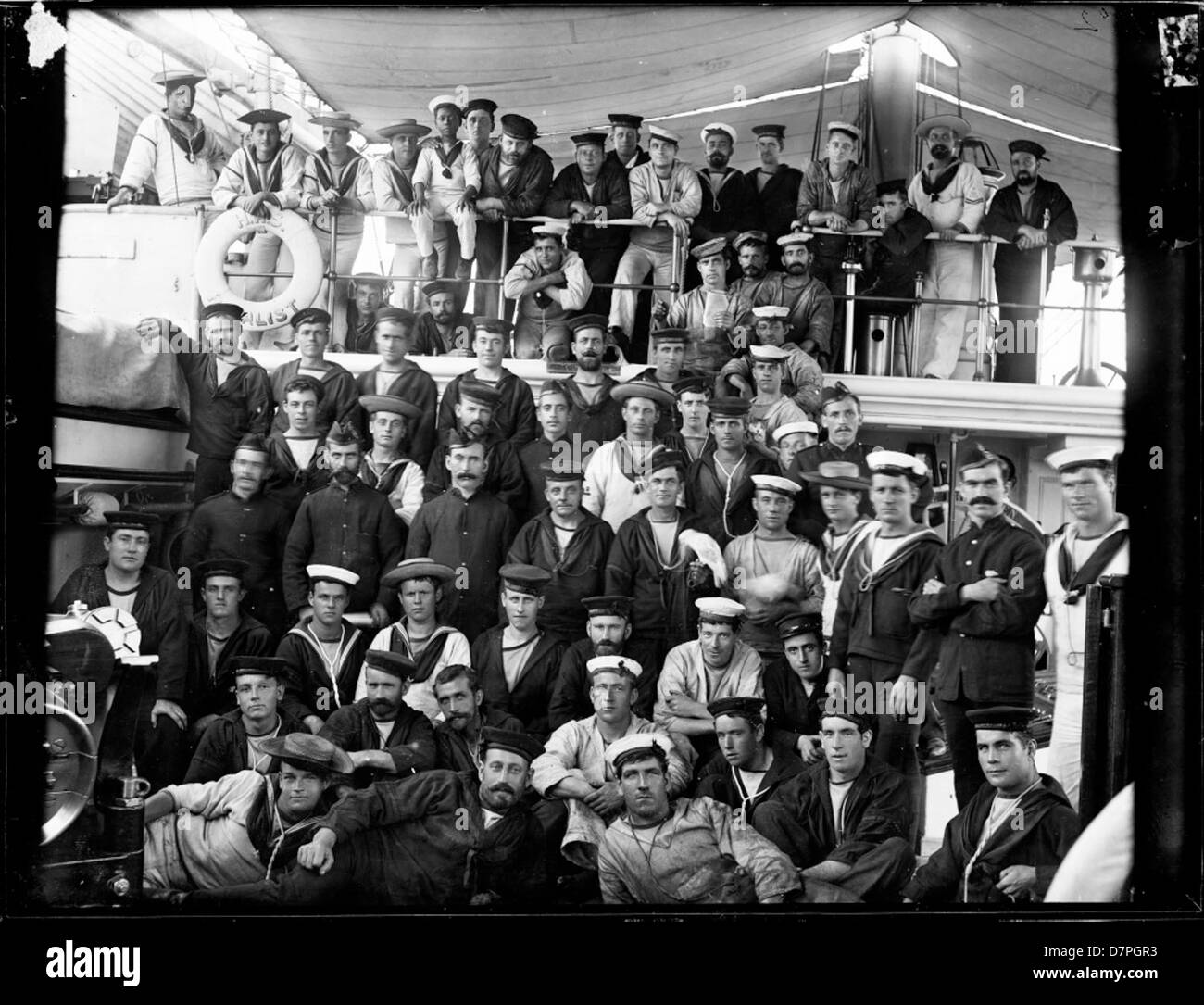 The image features crew members of the British Royal Navy's HMS ...