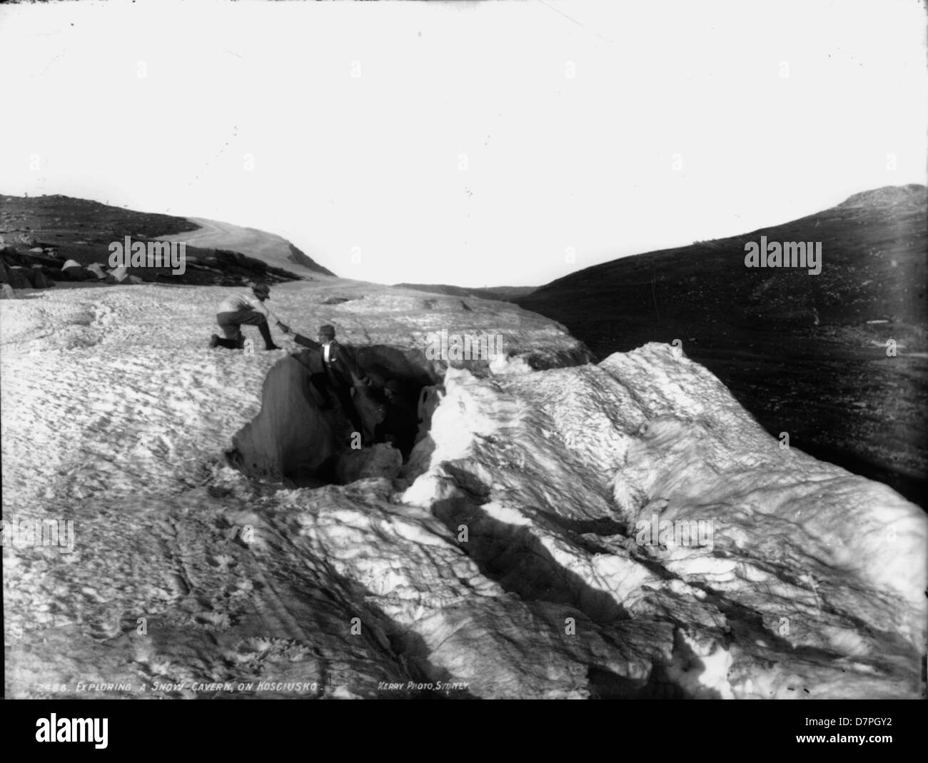 Exploring a snow cavern on Kosciusko Stock Photo - Alamy