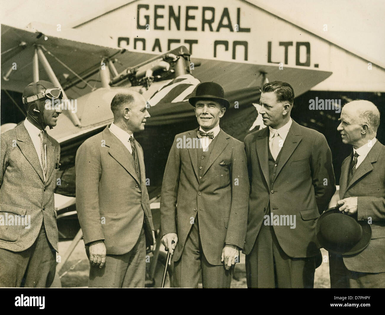 This historic photograph shows a group of people gathered during the ...