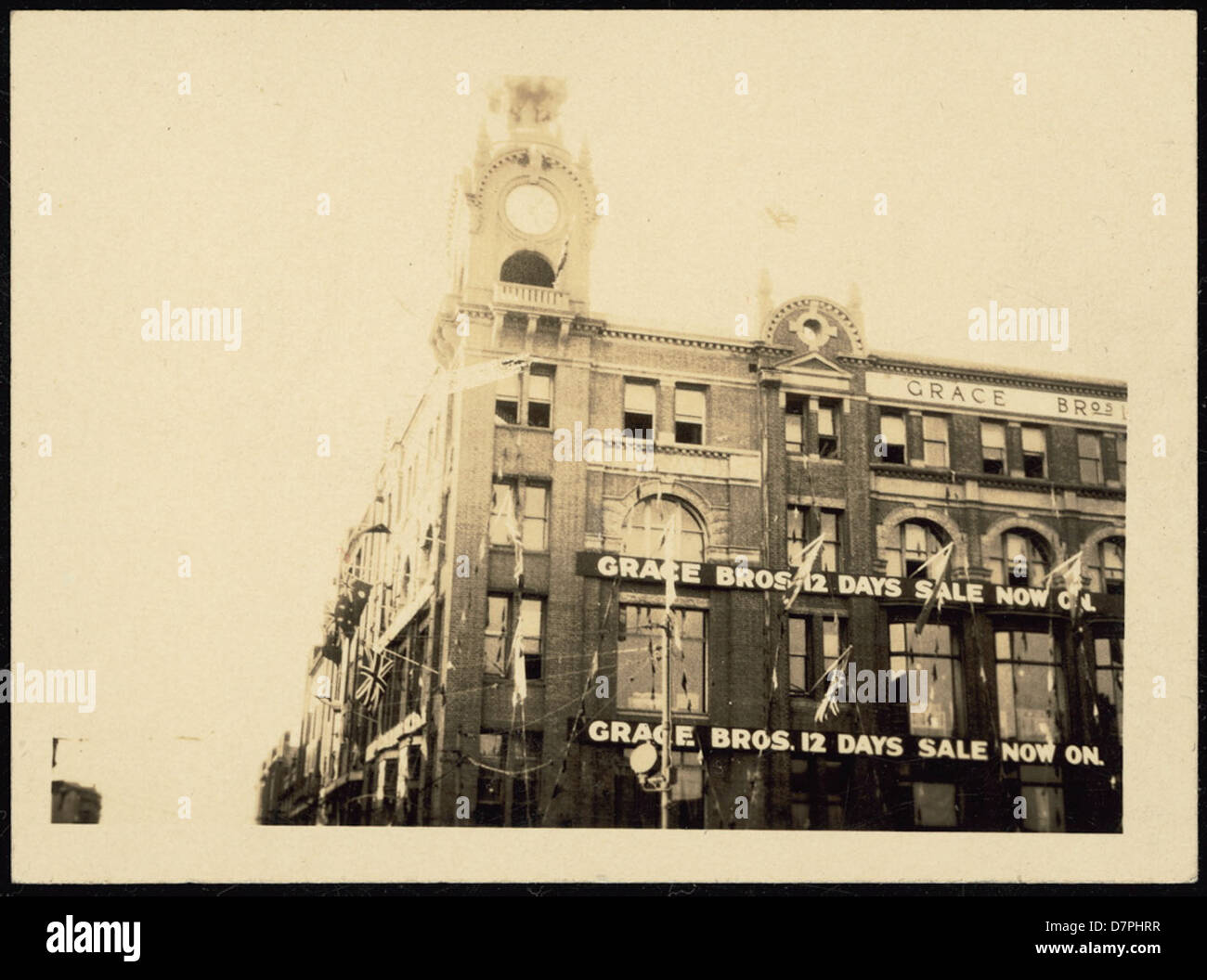 This historical image shows the advertising signs for the 12 Days Sale ...