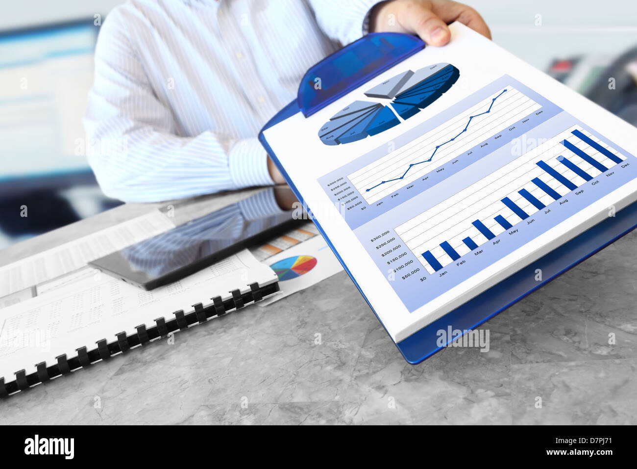 Businessman with Charts Stock Photo - Alamy