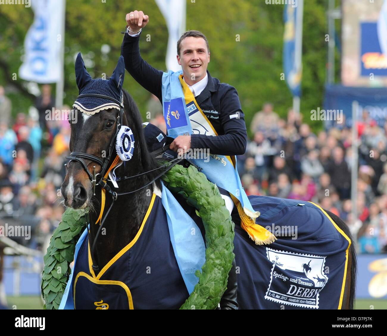 Gilbert Tillmann from Germany points to his horse Hello Max during ...